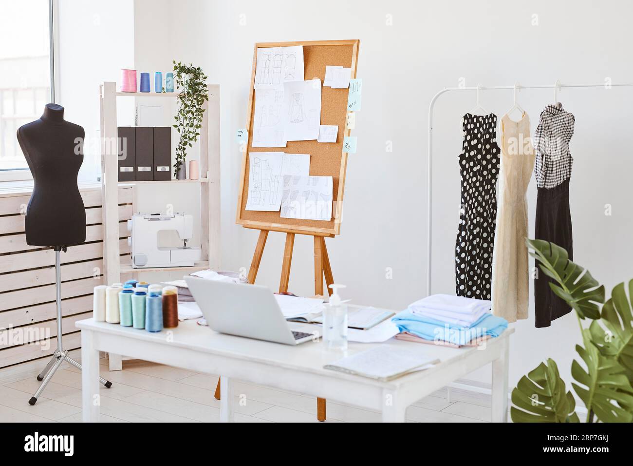 Fashion atelier idea board desk clothing line Stock Photo - Alamy