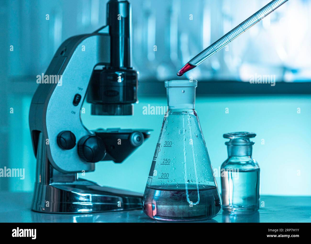 Lab glassware microscope arrangement Stock Photo - Alamy