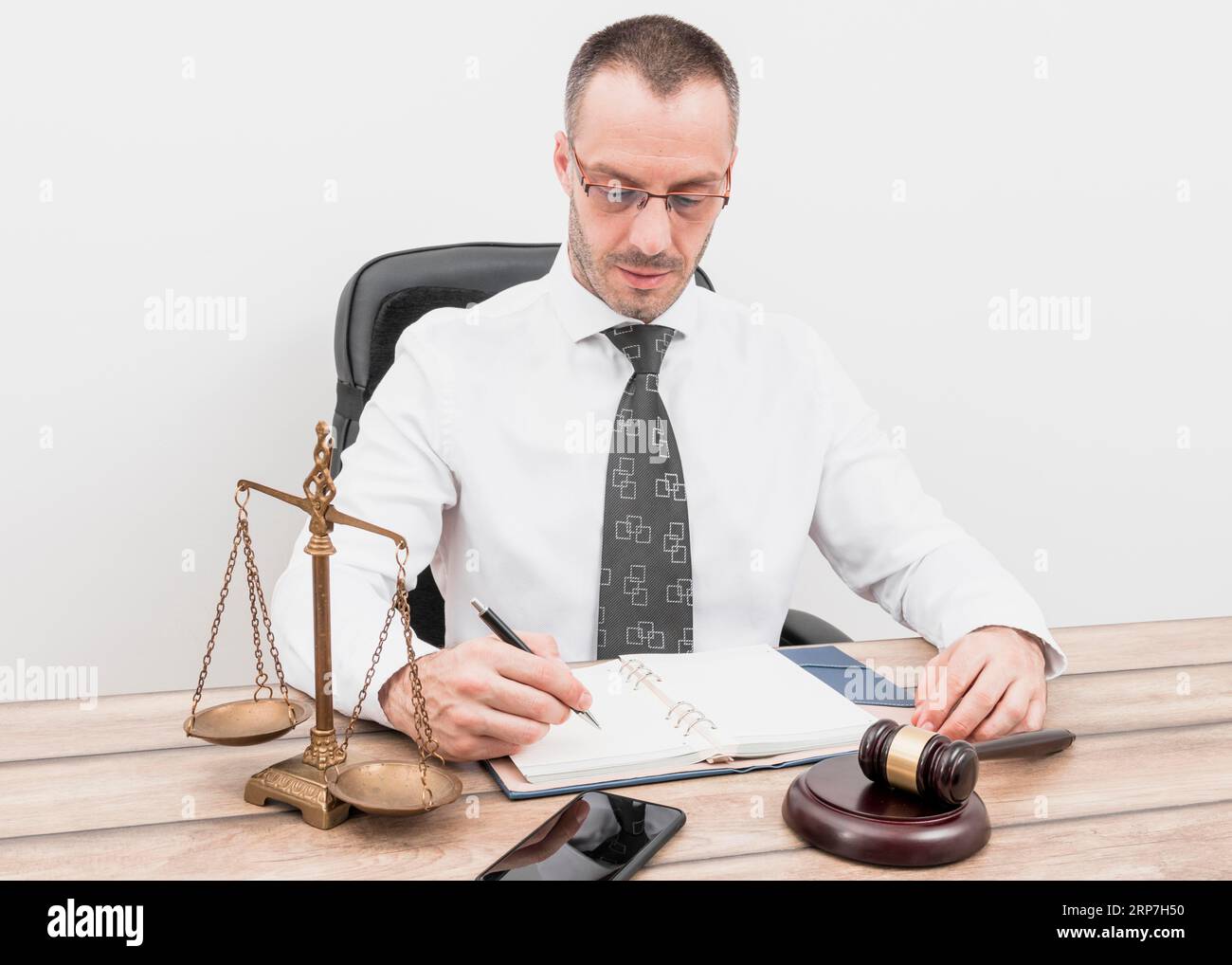 Lawyer writing appointments Stock Photo - Alamy