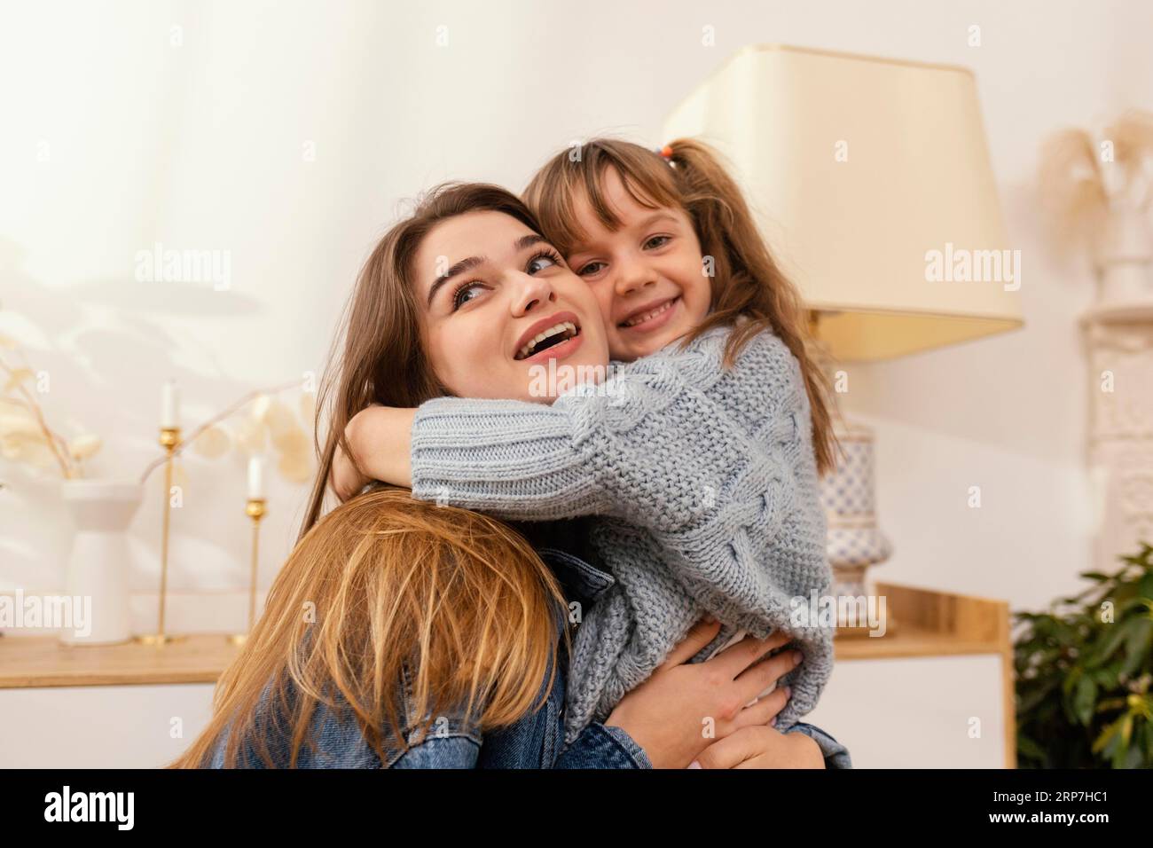 Mother daughter home hugging Stock Photo - Alamy Mother daughter home hugging Stock Photo - Alamy