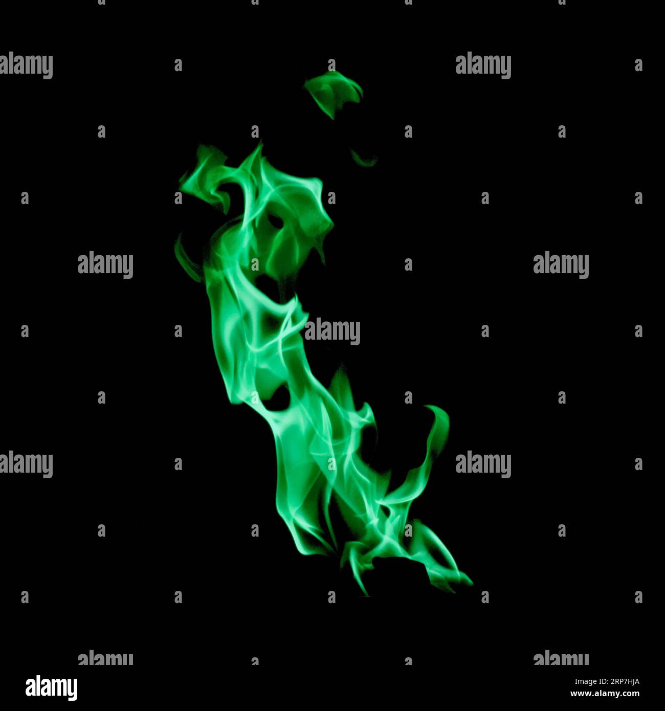 Small blaze green fire Stock Photo - Alamy