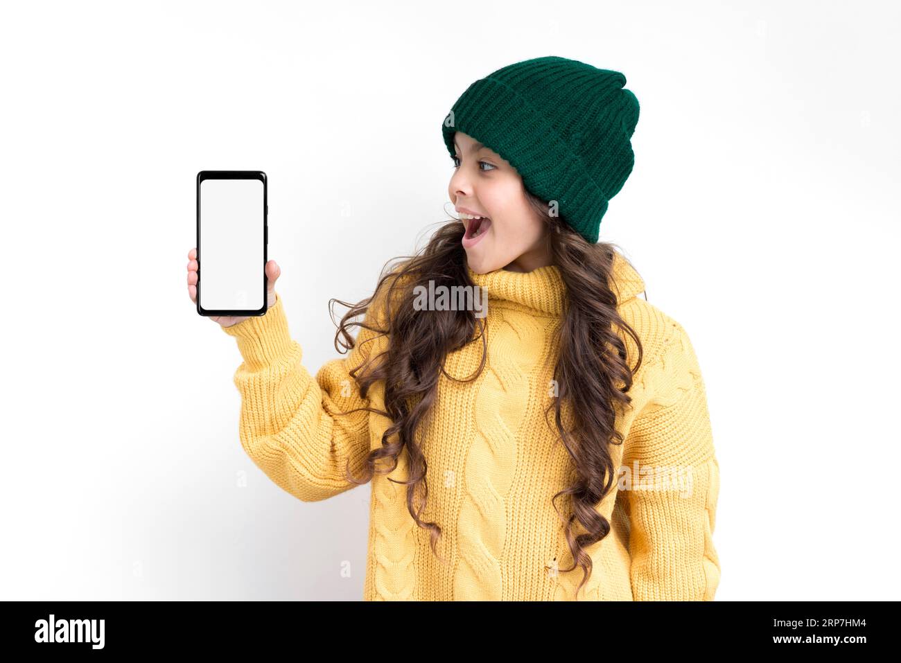 Smiley girl holding phone mock up Stock Photo - Alamy