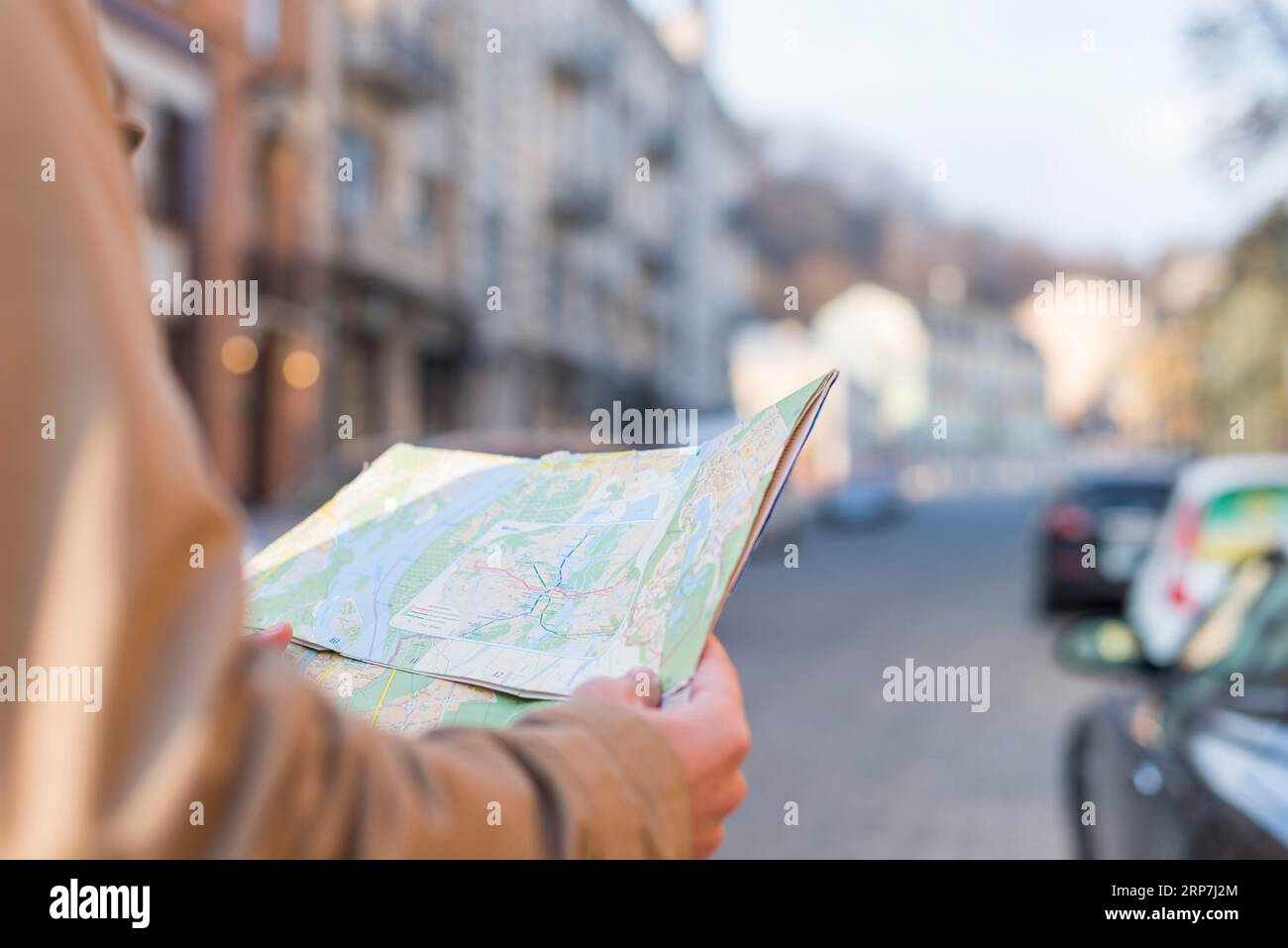 Close up male traveler holding map hand standing city street Stock ...
