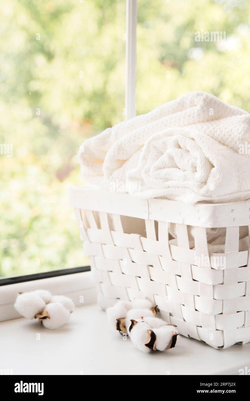 White laundry basket window Stock Photo - Alamy