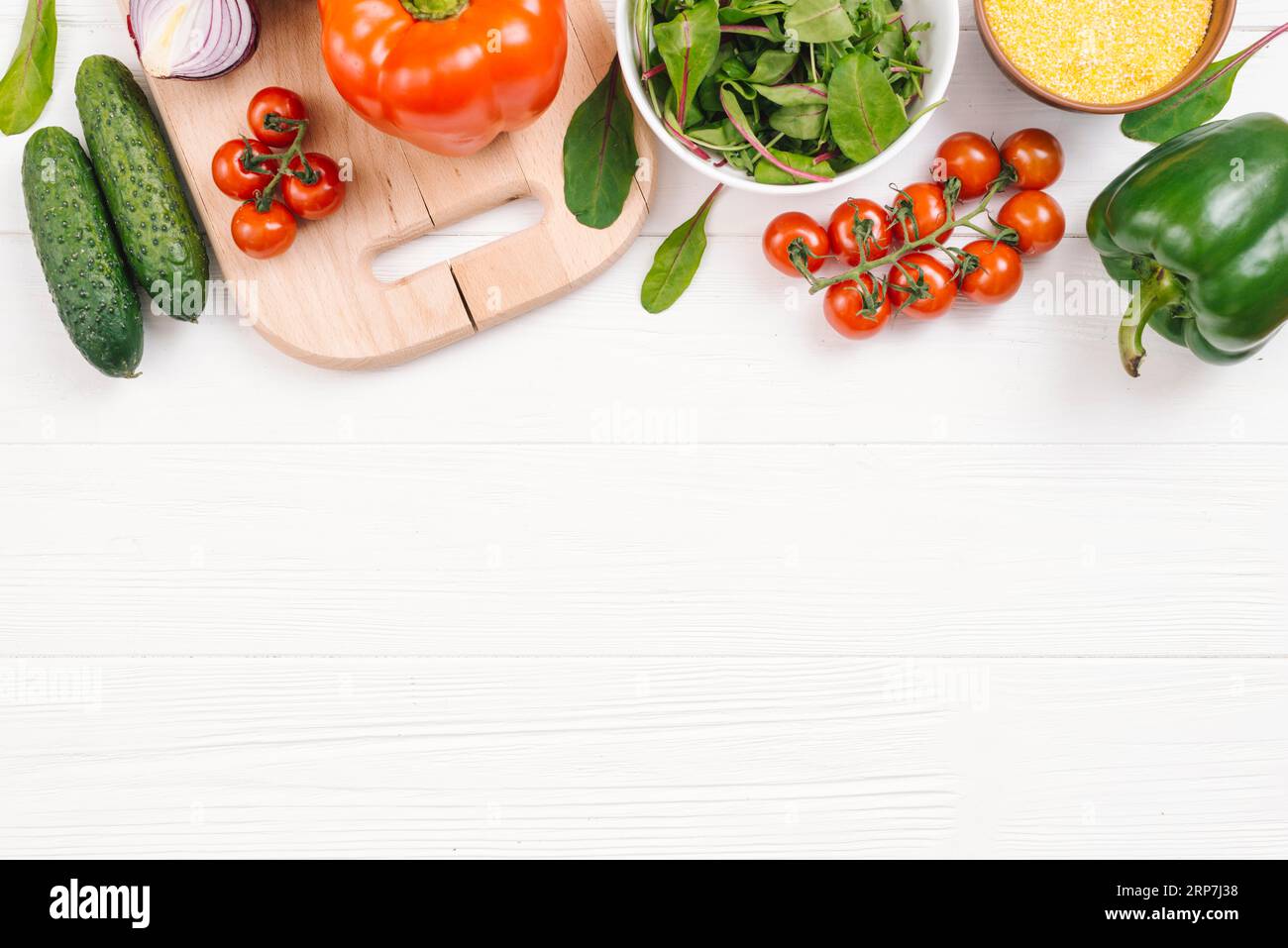 Elevated view fresh vegetables white wooden desk Stock Photo - Alamy