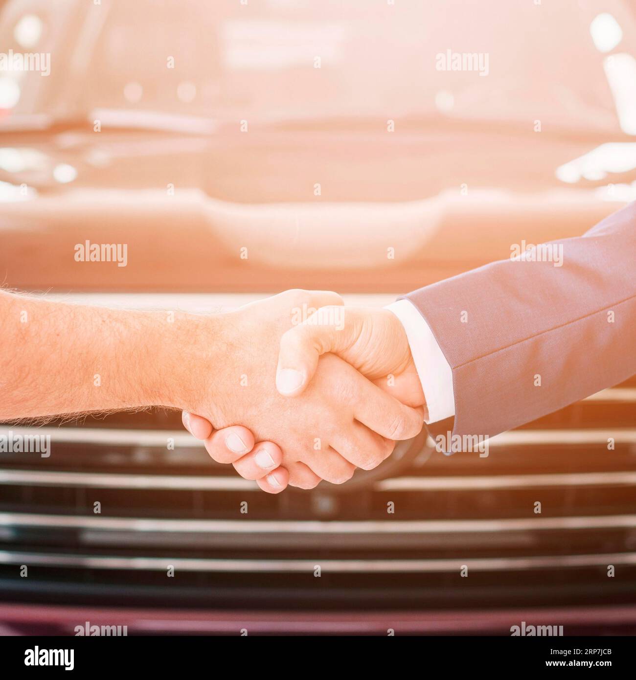 Handshake car dealership Stock Photo - Alamy