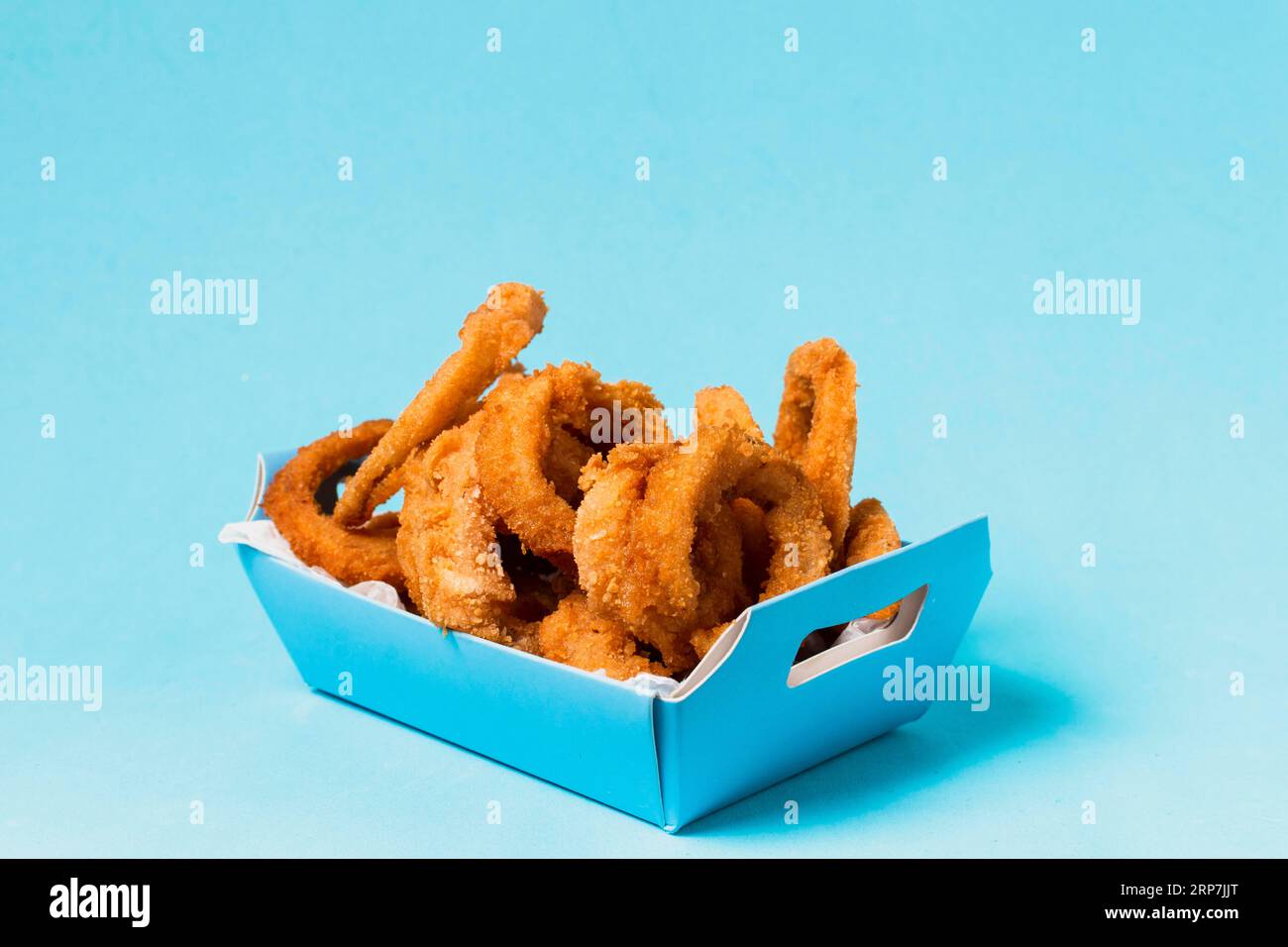 Onion rings blue box Stock Photo - Alamy