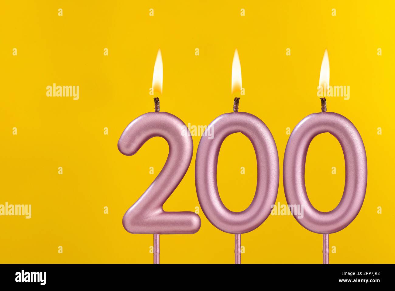 Birthday candle number 200 - Birthday celebration on yellow background ...