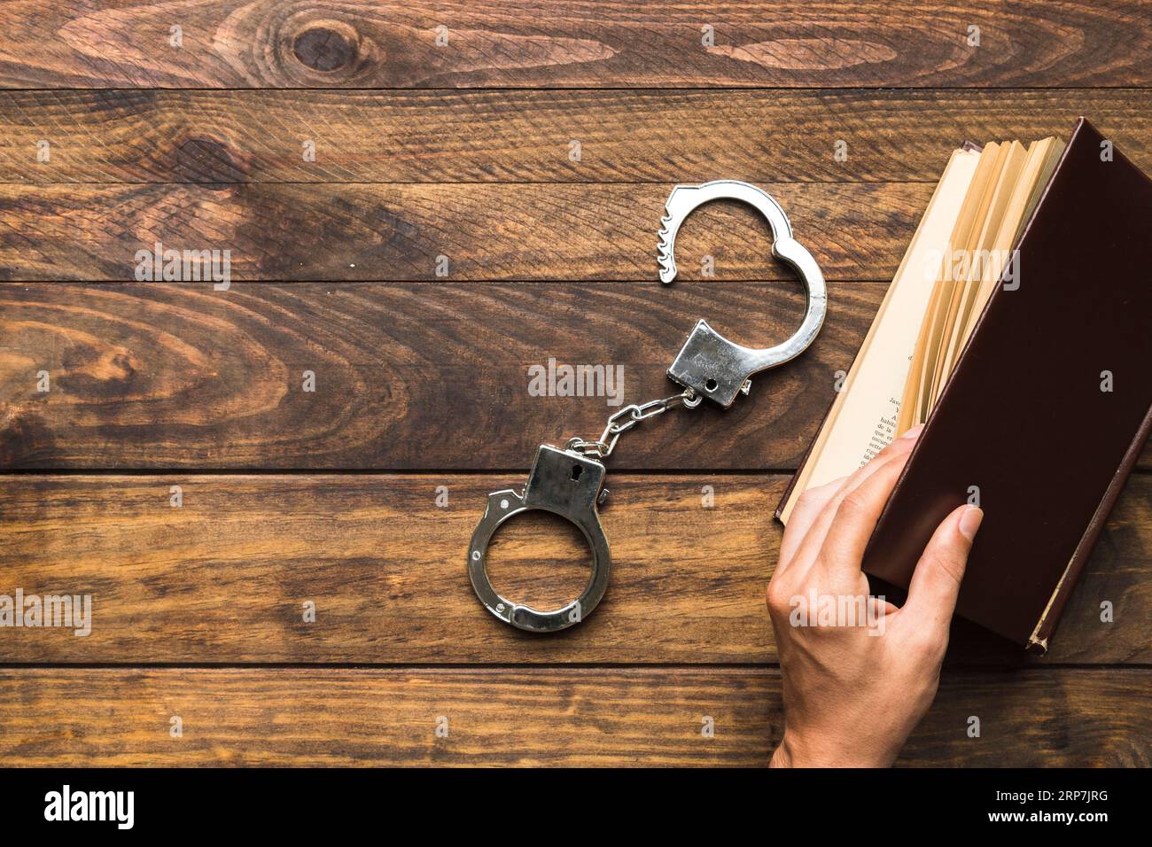 Hand opening book hi-res stock photography and images - Alamy