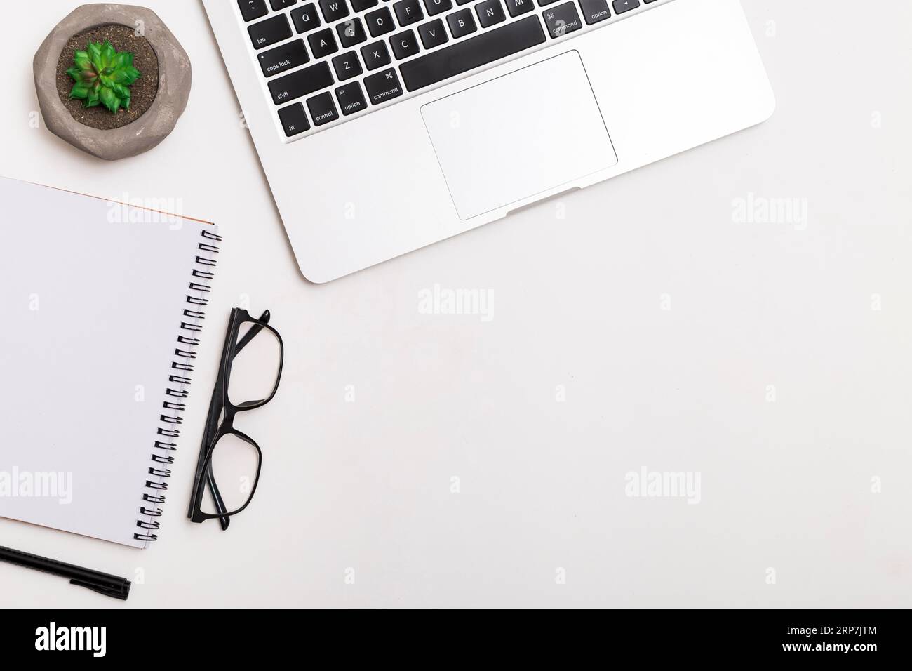 Workspace with laptop white background Stock Photo - Alamy