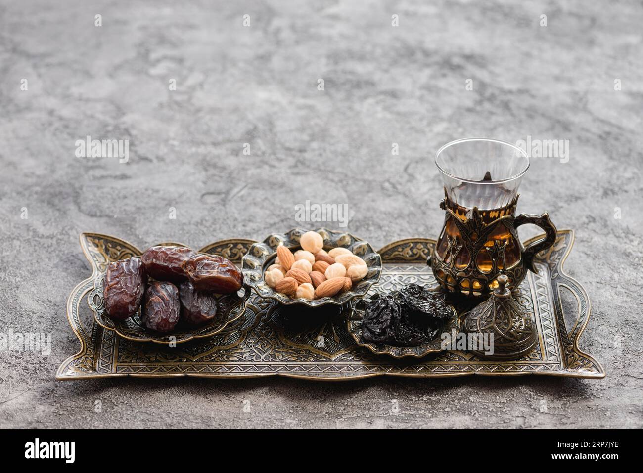 Traditional turkish arabic tea glasses dates nuts metallic tray ...