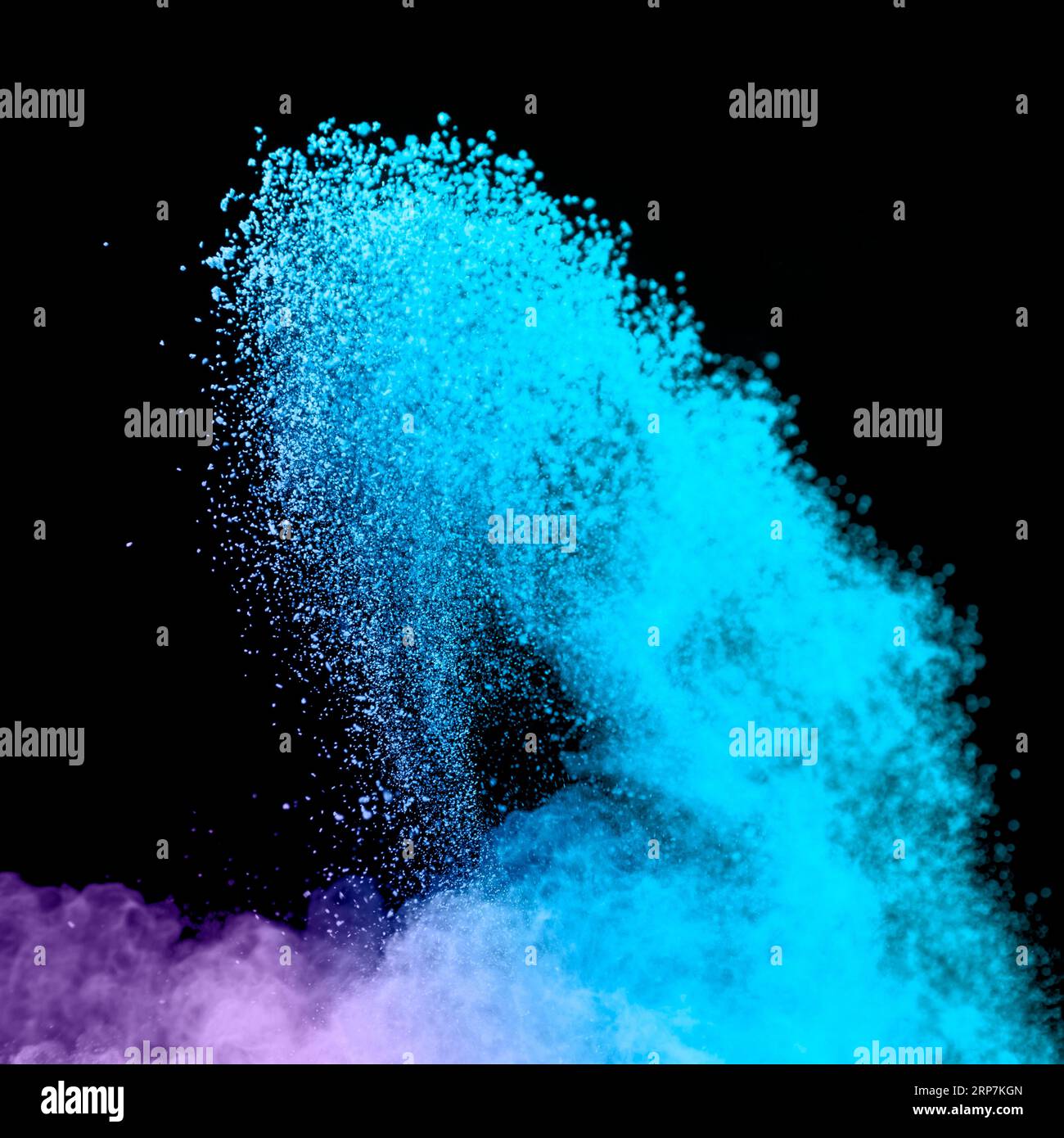 Blue burst powder dark background Stock Photo - Alamy