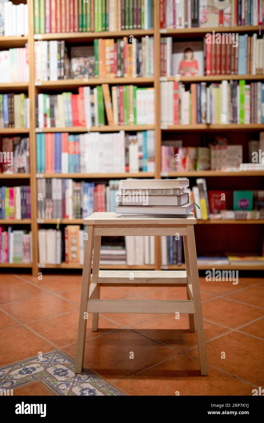 Books lying ladder bookstore Stock Photo - Alamy