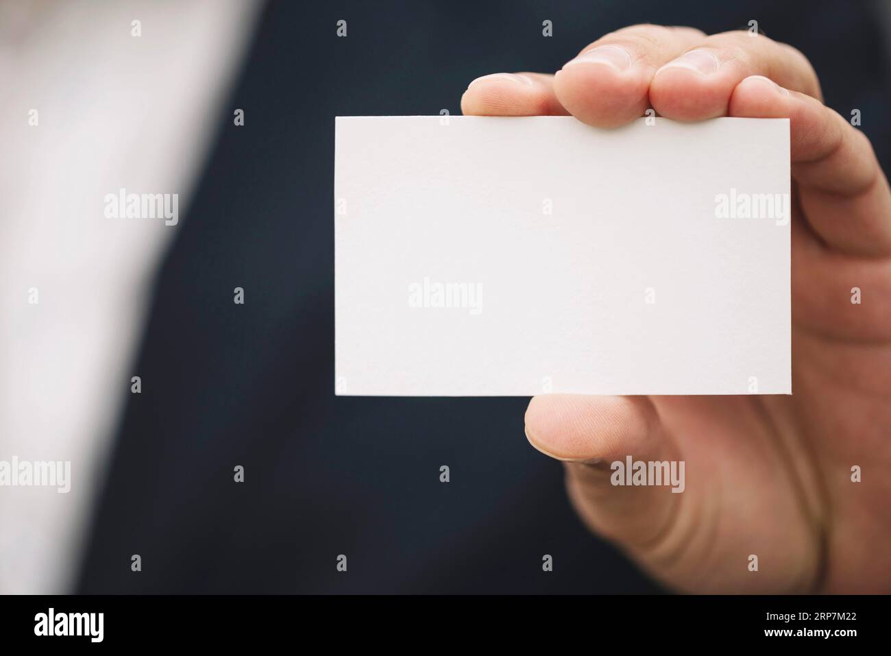 Close up visiting card hand Stock Photo - Alamy