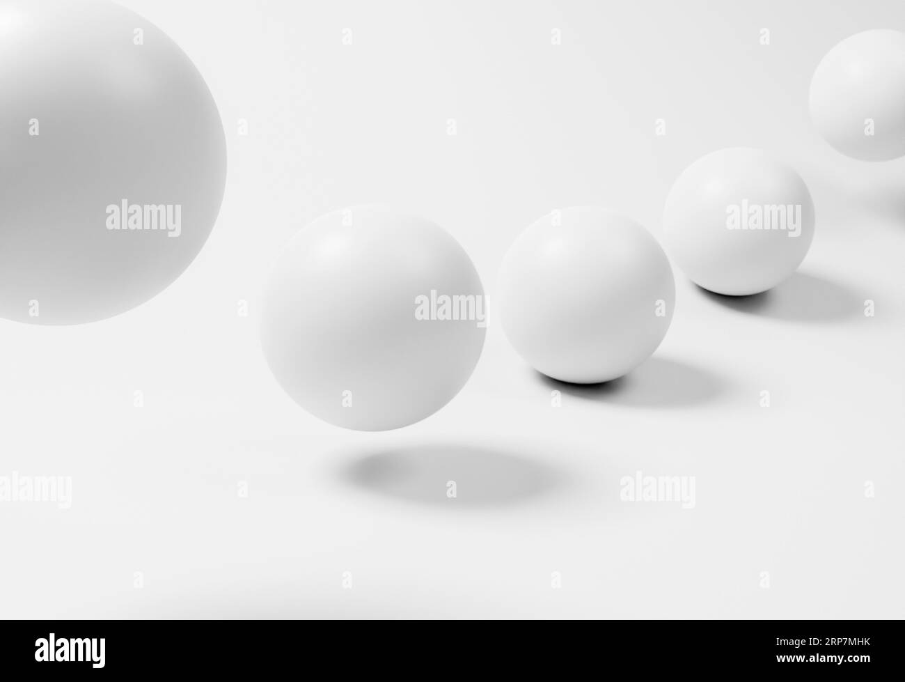 Creative wallpaper with white spheres Stock Photo - Alamy