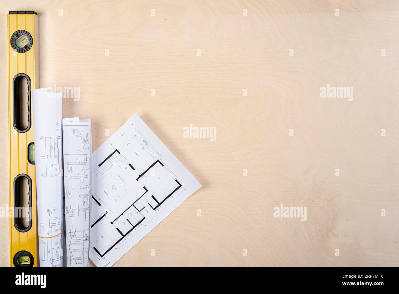 Flat lay architectural plans desk with copy space Stock Photo - Alamy