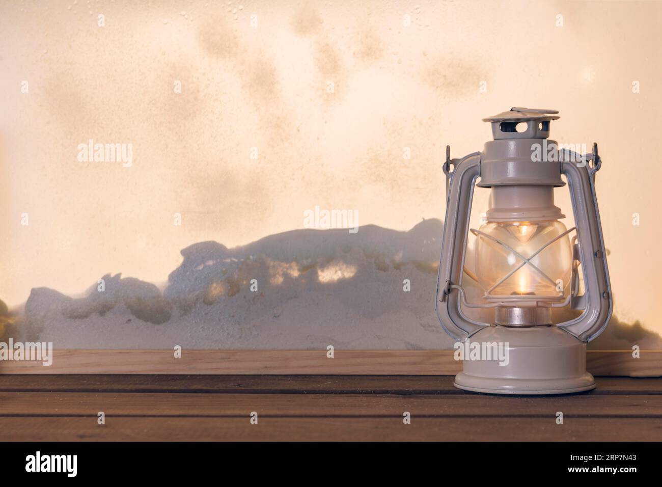 Gas lantern wooden board near heap snow through window Stock Photo - Alamy
