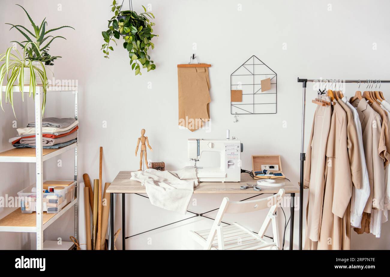 Front view tailoring studio with garments Stock Photo - Alamy