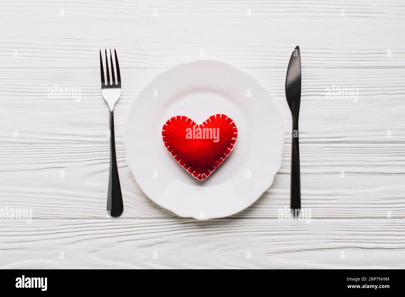 Handmade heart plate Stock Photo - Alamy