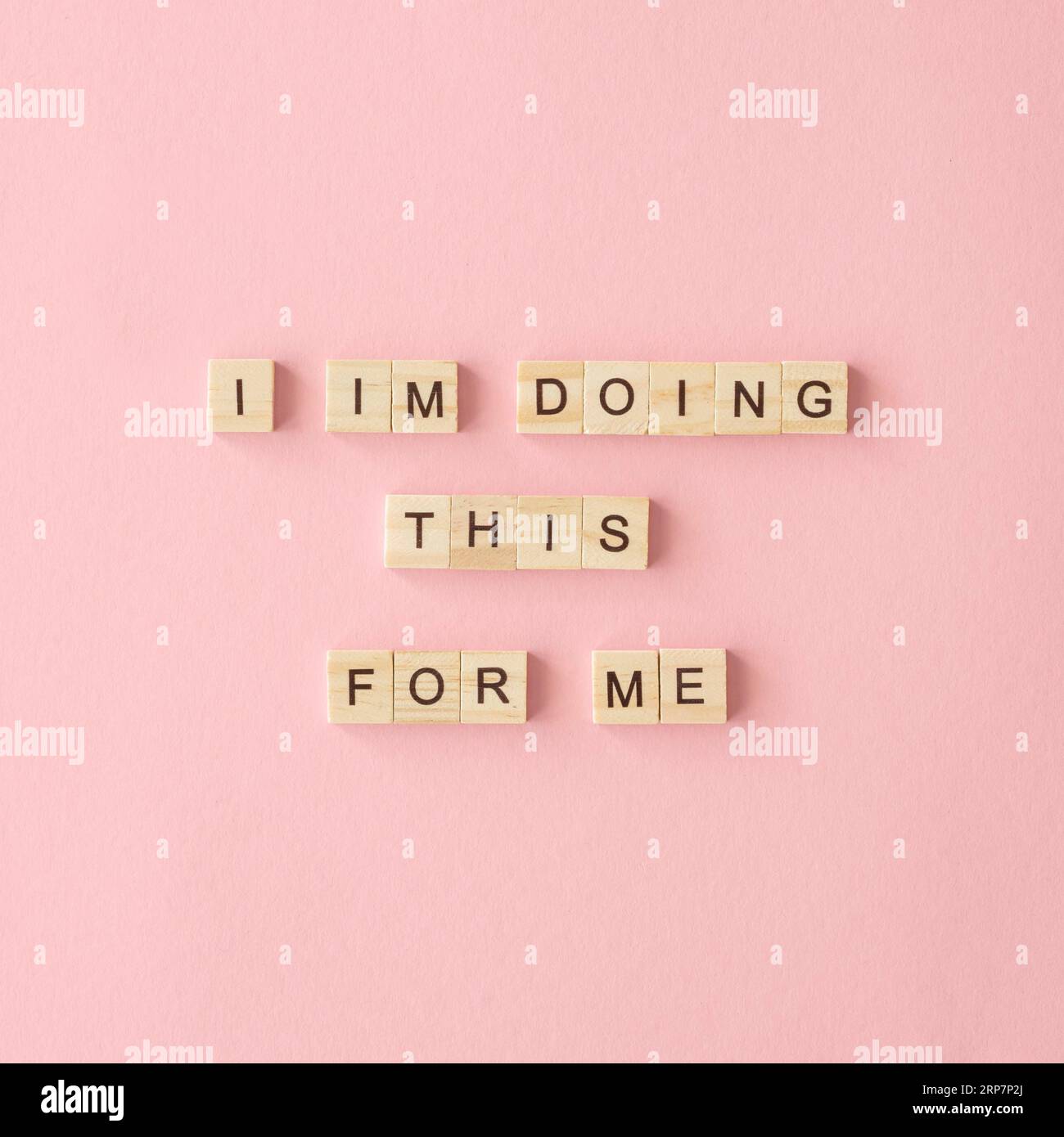 Motivational text pink background Stock Photo - Alamy
