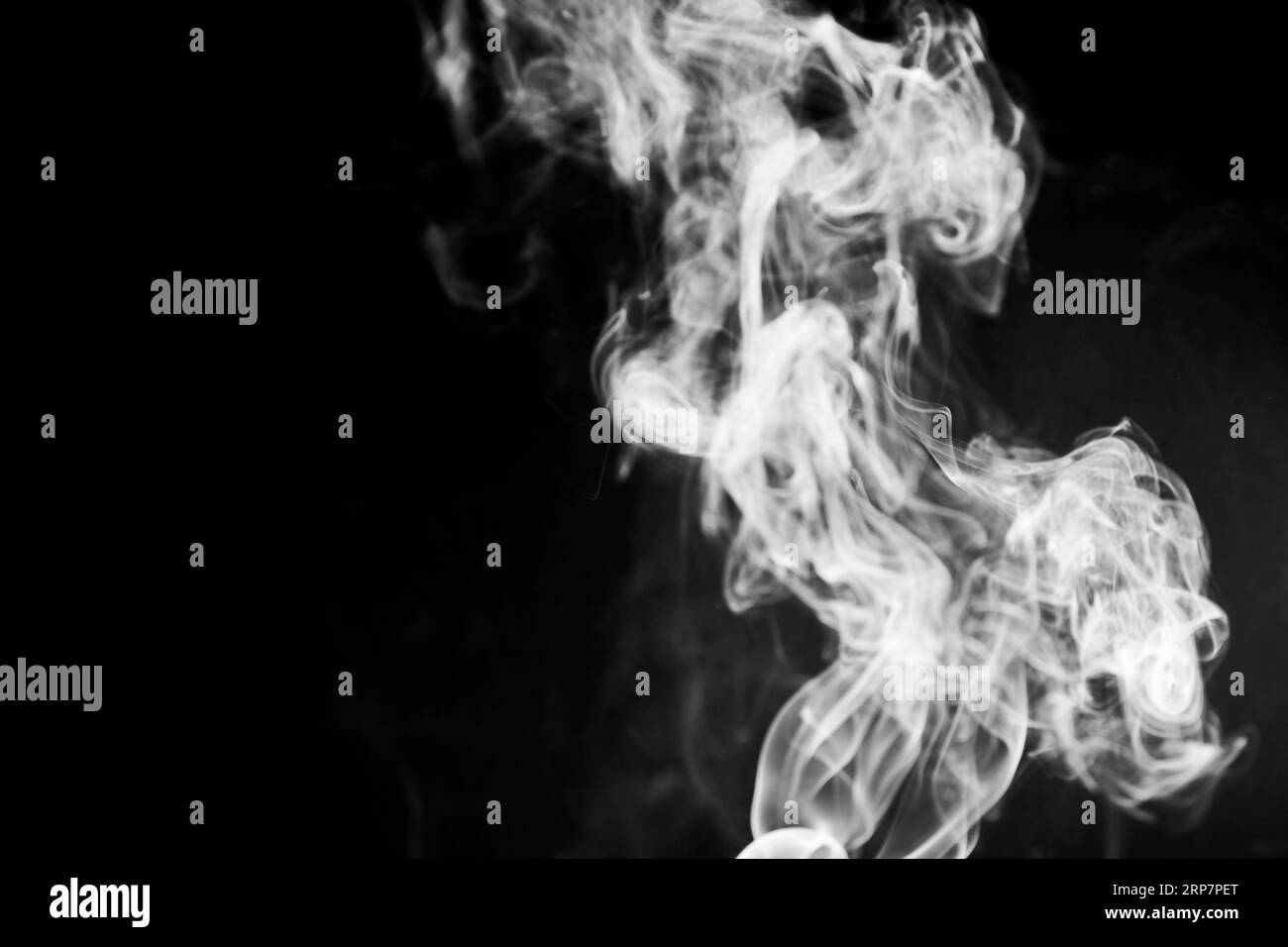 Smooth trickles smoke Stock Photo - Alamy