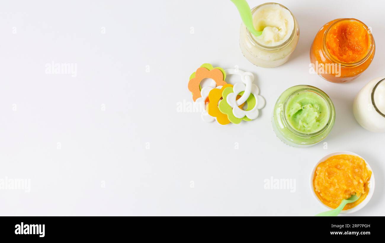 Top view baby food white background Stock Photo - Alamy
