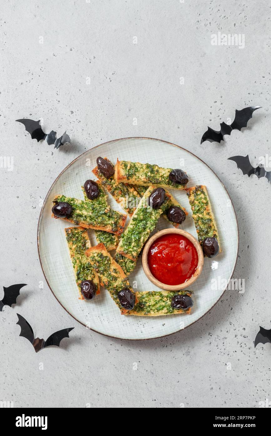 Halloween food. Halloween witch's fingers garlic bread toast with ...