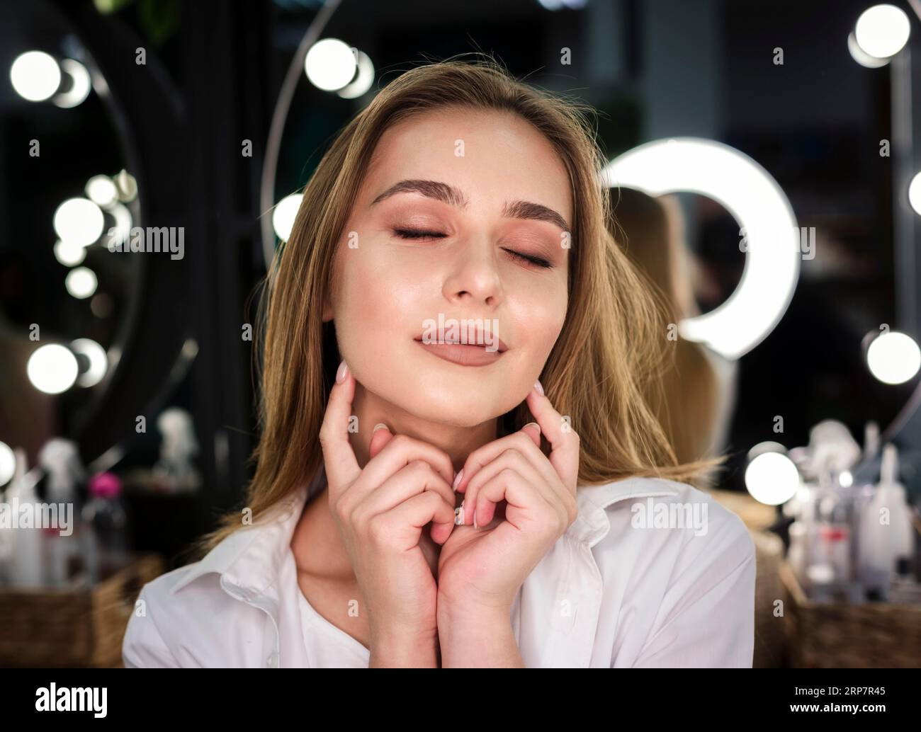 Woman touching shoulder closed hi-res stock photography and images - Alamy