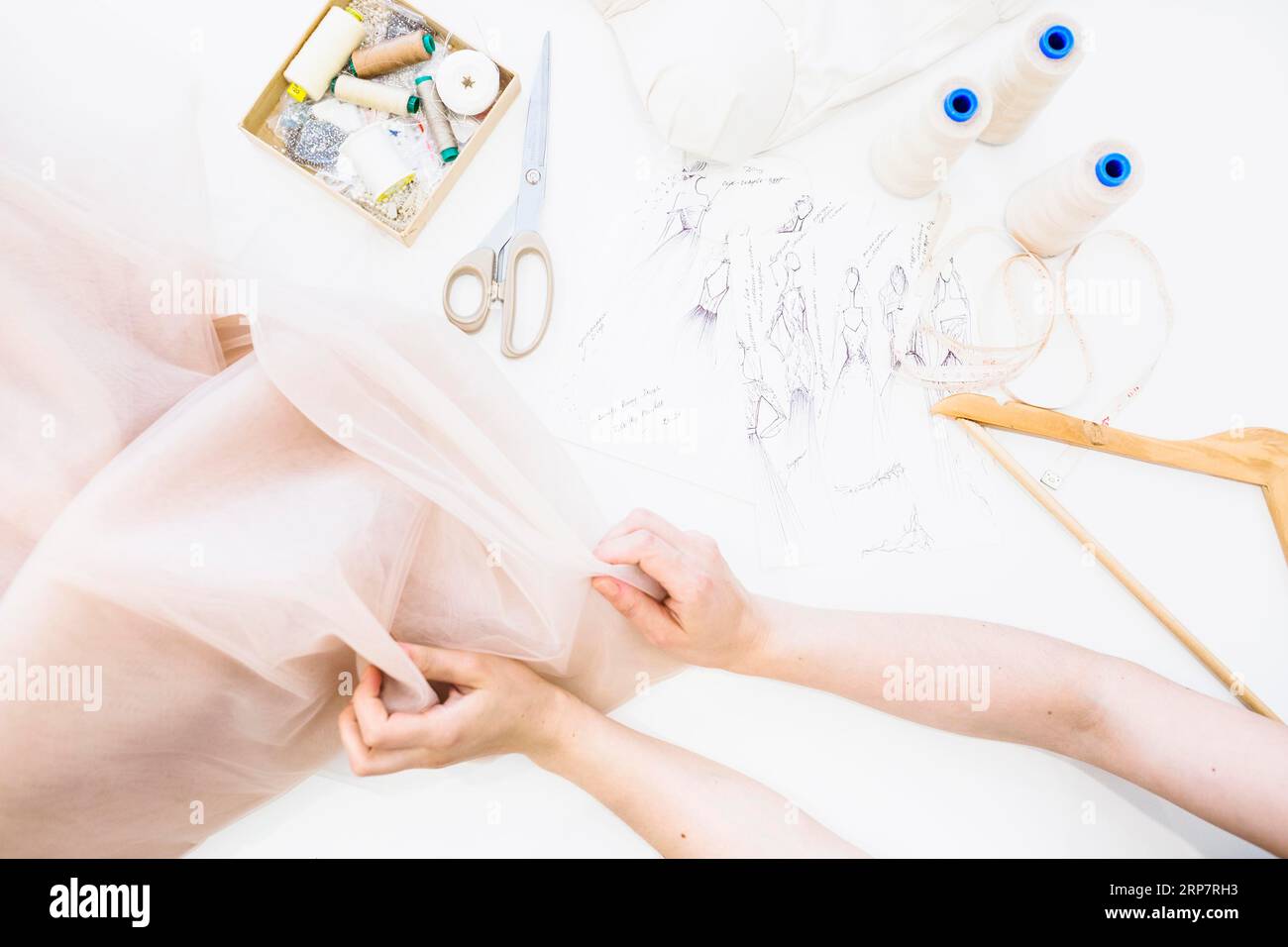 Female designer looking fabric hi-res stock photography and images - Alamy