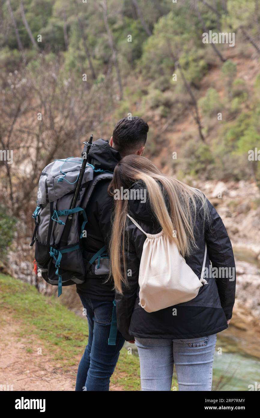 Couple with backpack exploring nature 3 Stock Photo - Alamy