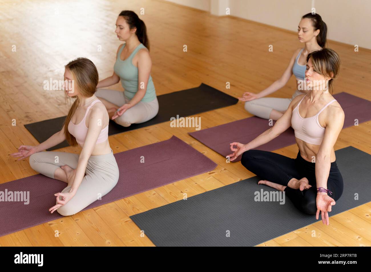 Female yoga teacher teaching class14 Stock Photo - Alamy