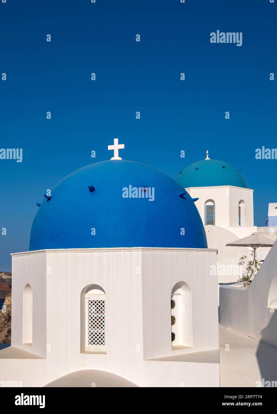 White churches with blue dome, Agios Spiridonas, St Spyridon, and ...
