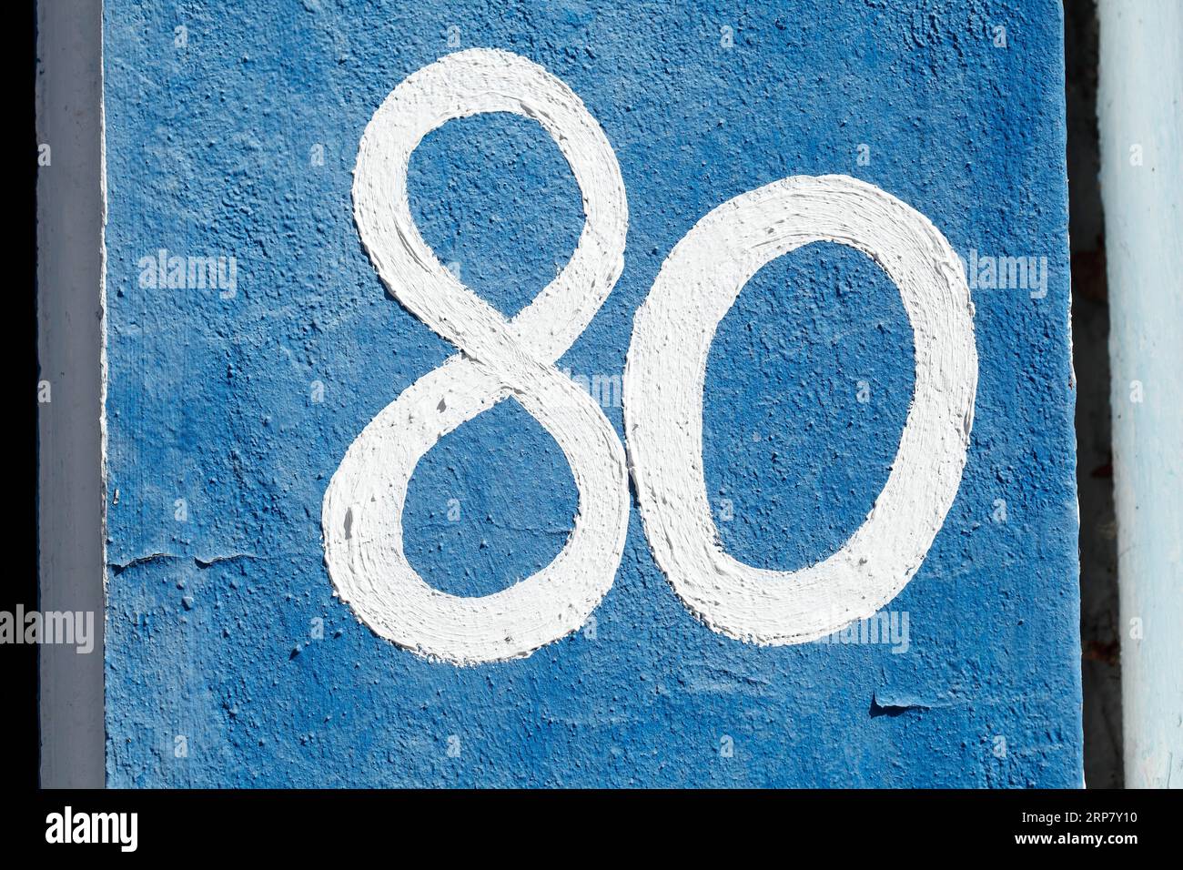 House number sign number eighty on blue house wall, Germany Stock Photo ...