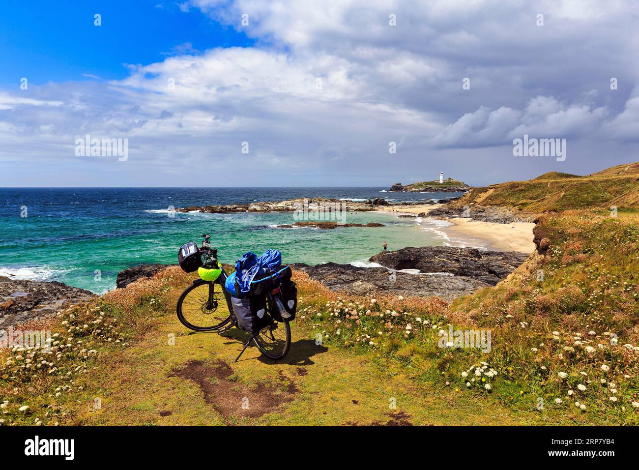 E-bike on the South West Coast Path, coastline with Godrevy Island and ...