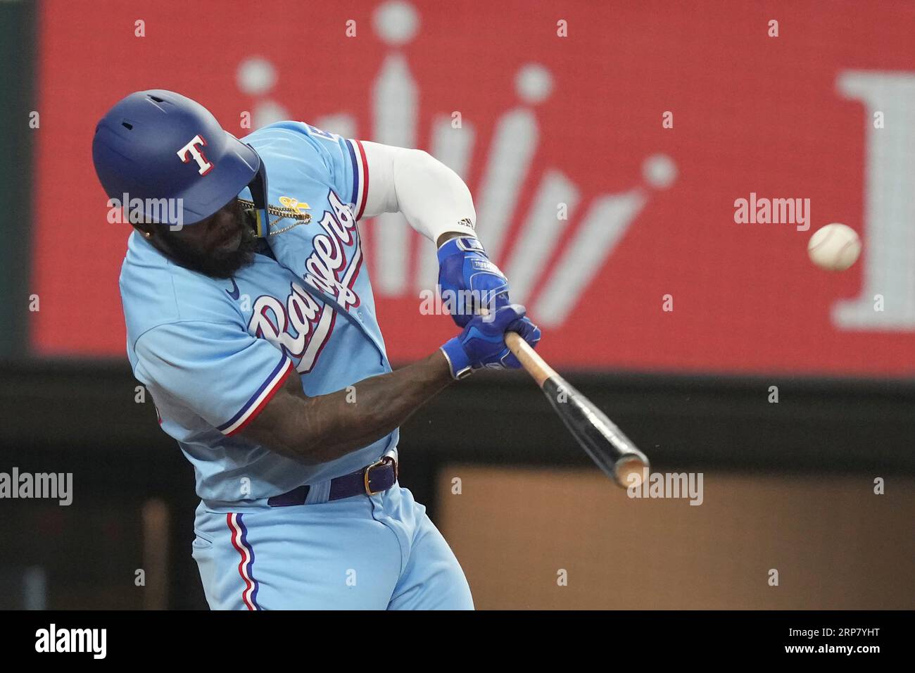 Texas Rangers' Adolis Garcia hits a solo home run during the ninth ...