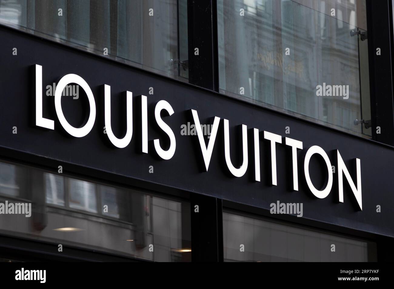 Close-up, logo of the French luxury fashion brand Louis Vuitton on a ...