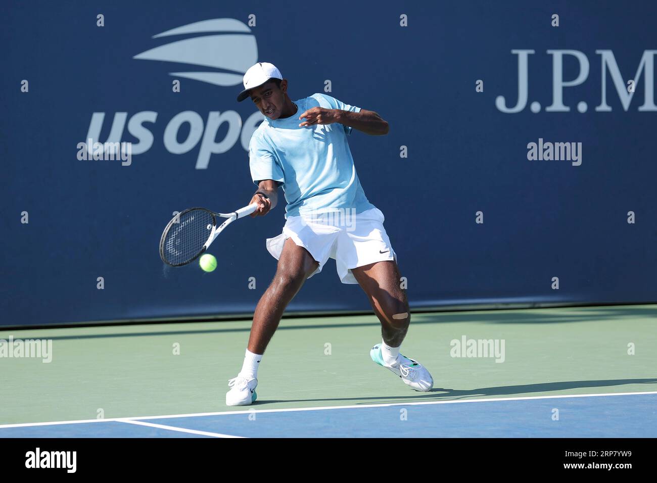 Adhithya Ganesan in action during a junior boys' singles match at the ...