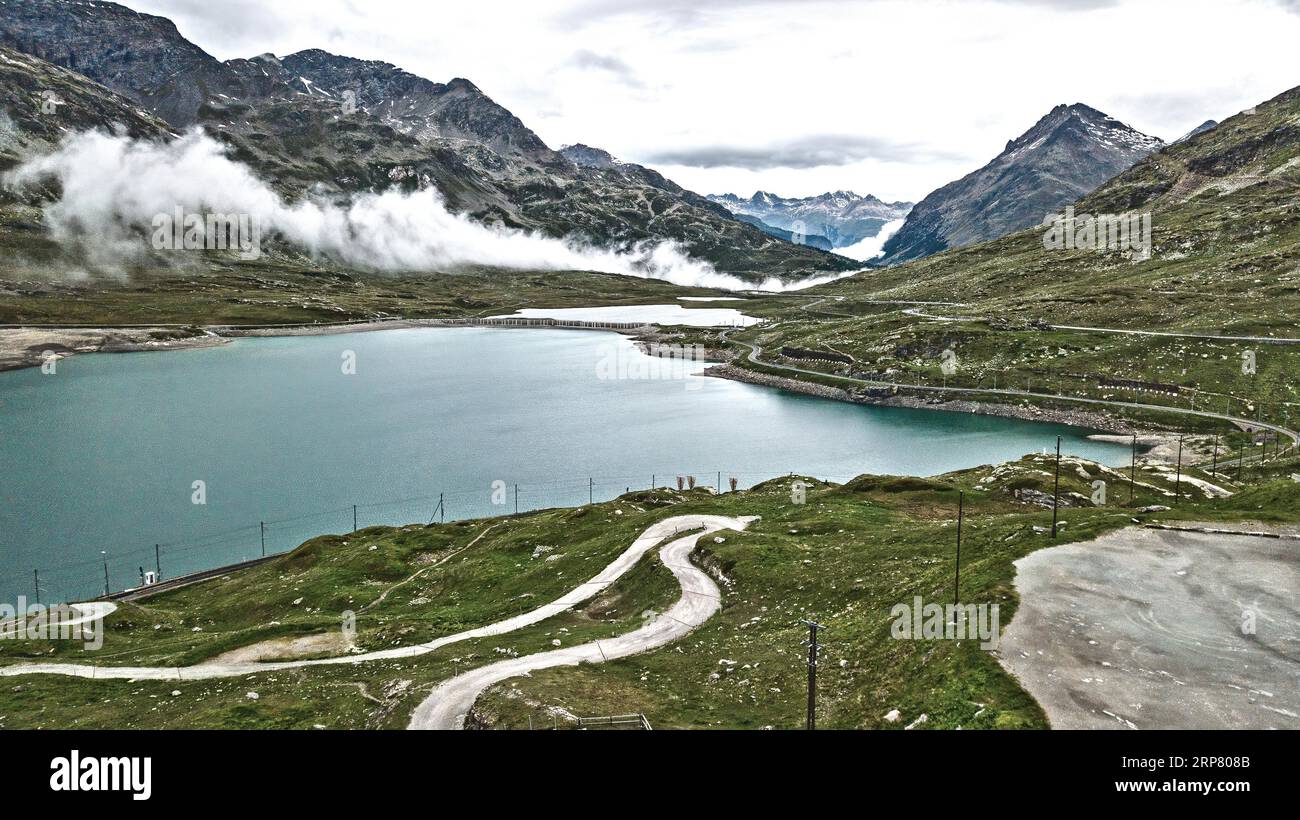Photo with reduced dynamics saturation HDR of mountain lake at mountain ...
