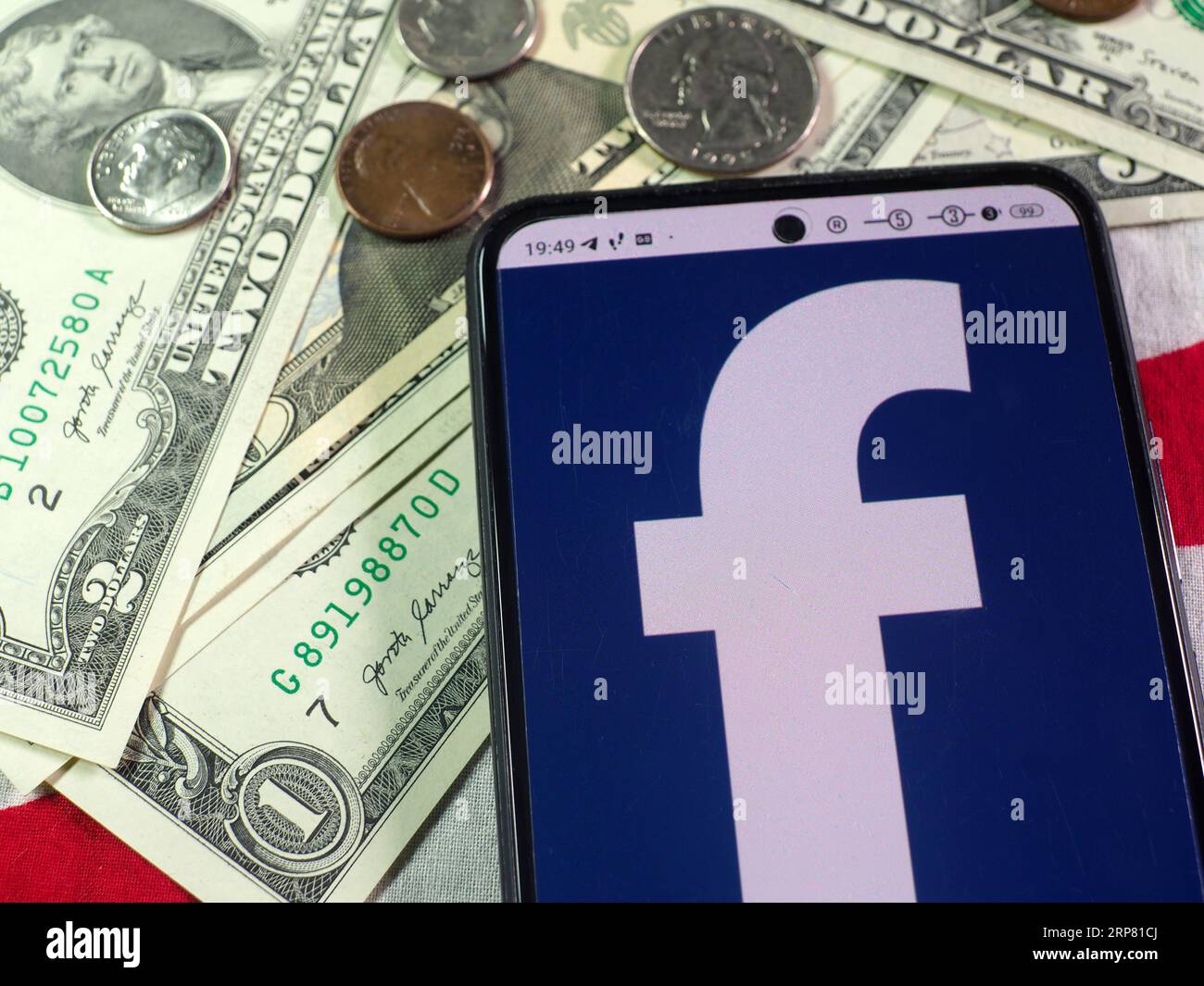 In this photo illustration, a Facebook logo is seen displayed on a ...