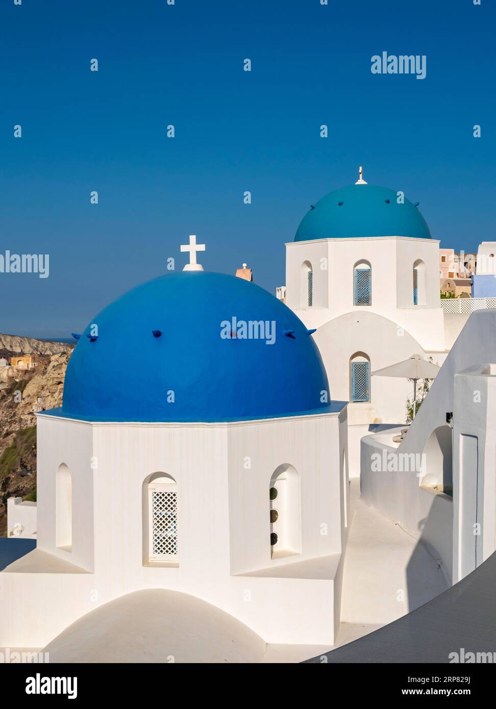 White churches with blue dome, Agios Spiridonas, St Spyridon, and ...
