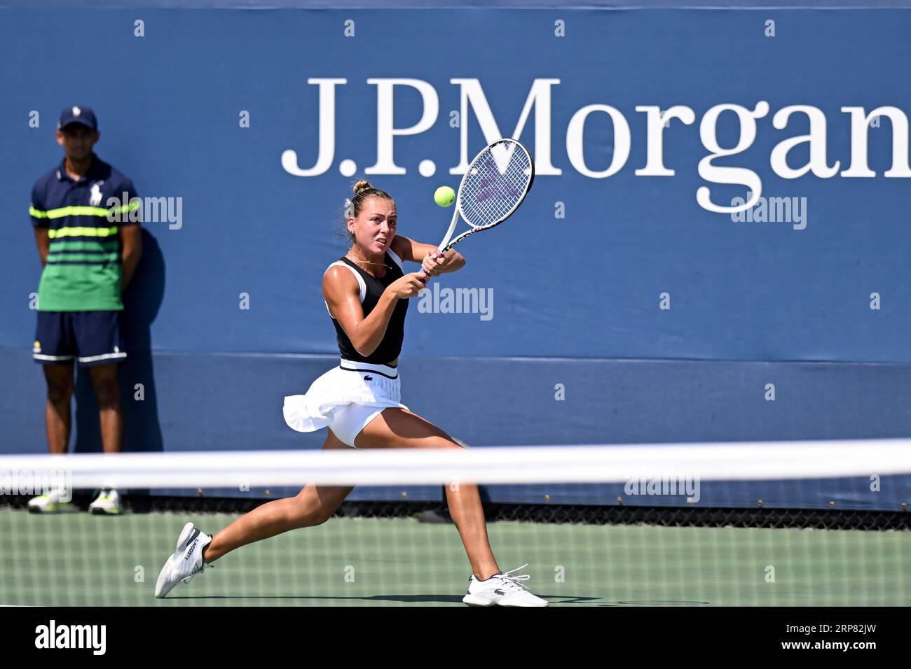 Tatum Evans in action during a junior girls' singles match at the 2023 ...