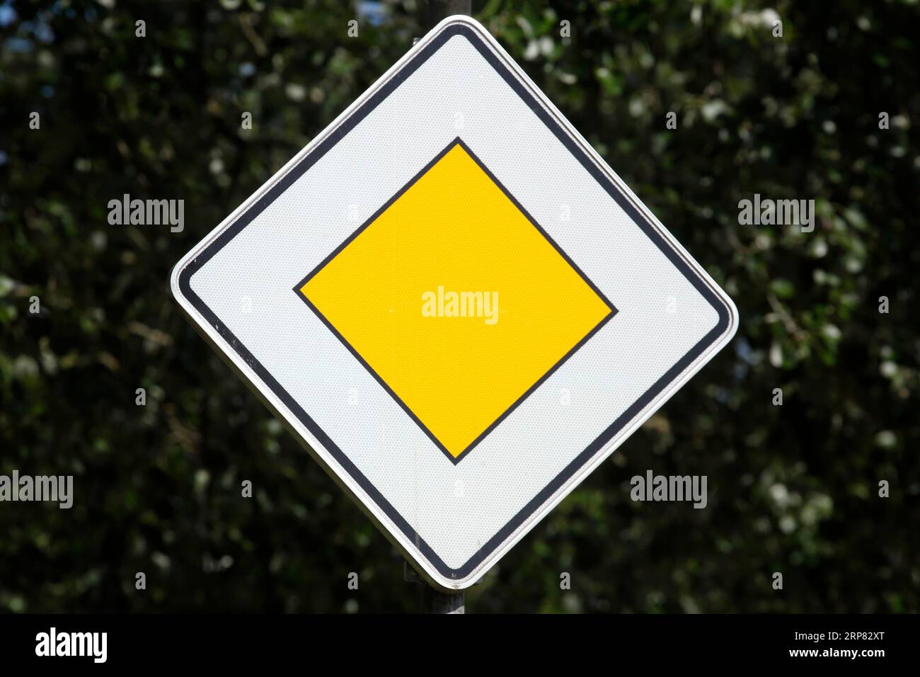 Road sign "Vorfahrtstrasse", right of way, Germany Stock Photo - Alamy