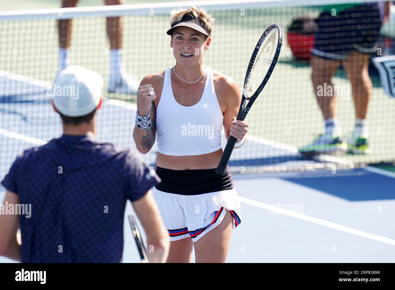 Bethanie Mattek-Sands reacts with Jamie Murray during a mixed doubles match at the 2023 US Open ...