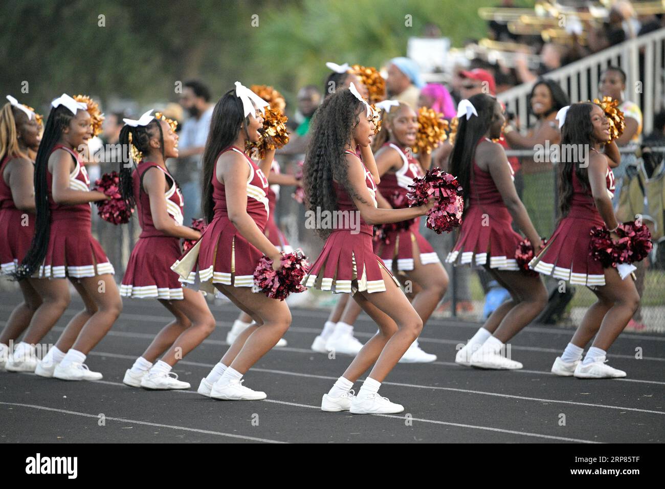 Wekiva cheerleaders perform on the track during the first half of a ...
