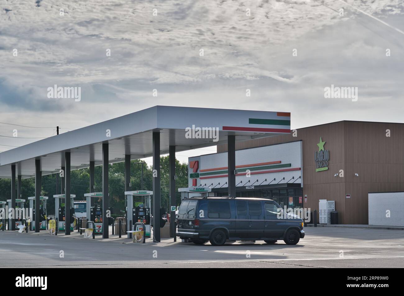 Houston, Texas USA 07-04-2023: 7-Eleven gas station and pumps with a ...