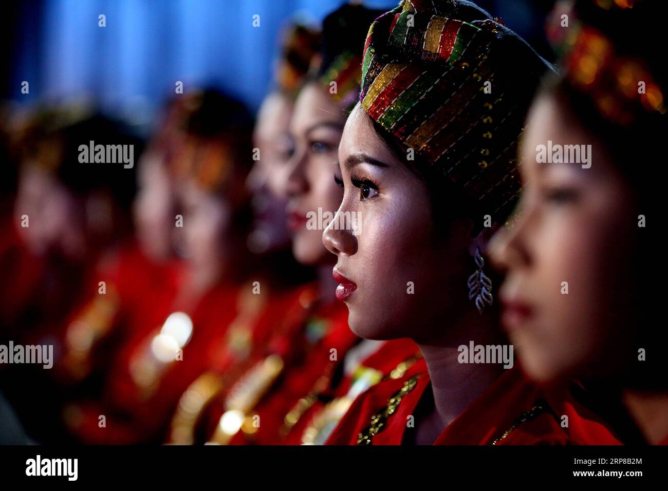 (190225) -- BEIJING, Feb. 25, 2019 -- Shan ethnic girls attend a ...