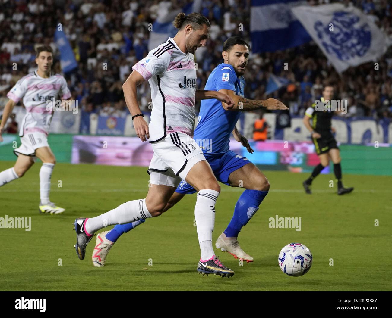 Juventus' Adrien Rabiot challenges Empoli's Giuseppe Pezzella during ...