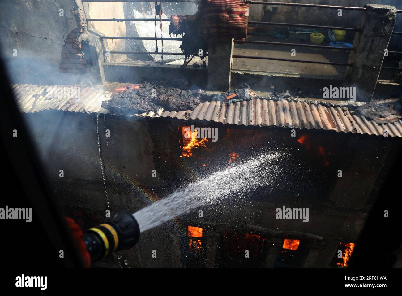 (190307) -- KATHMANDU, March 7, 2019 -- Fire fighters work to ...