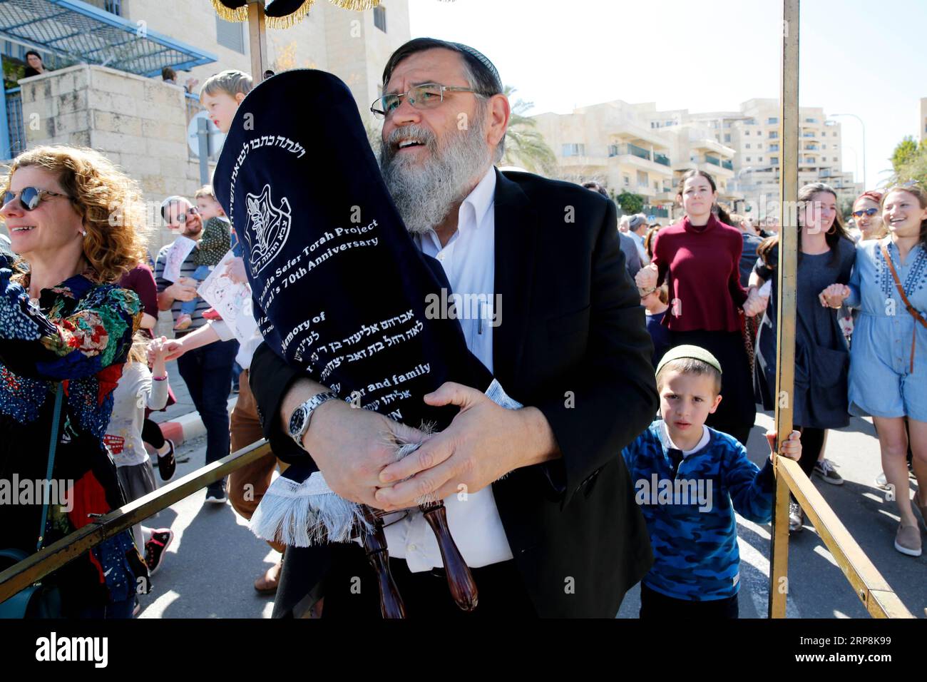 New sefer torah ceremony hi-res stock photography and images - Alamy
