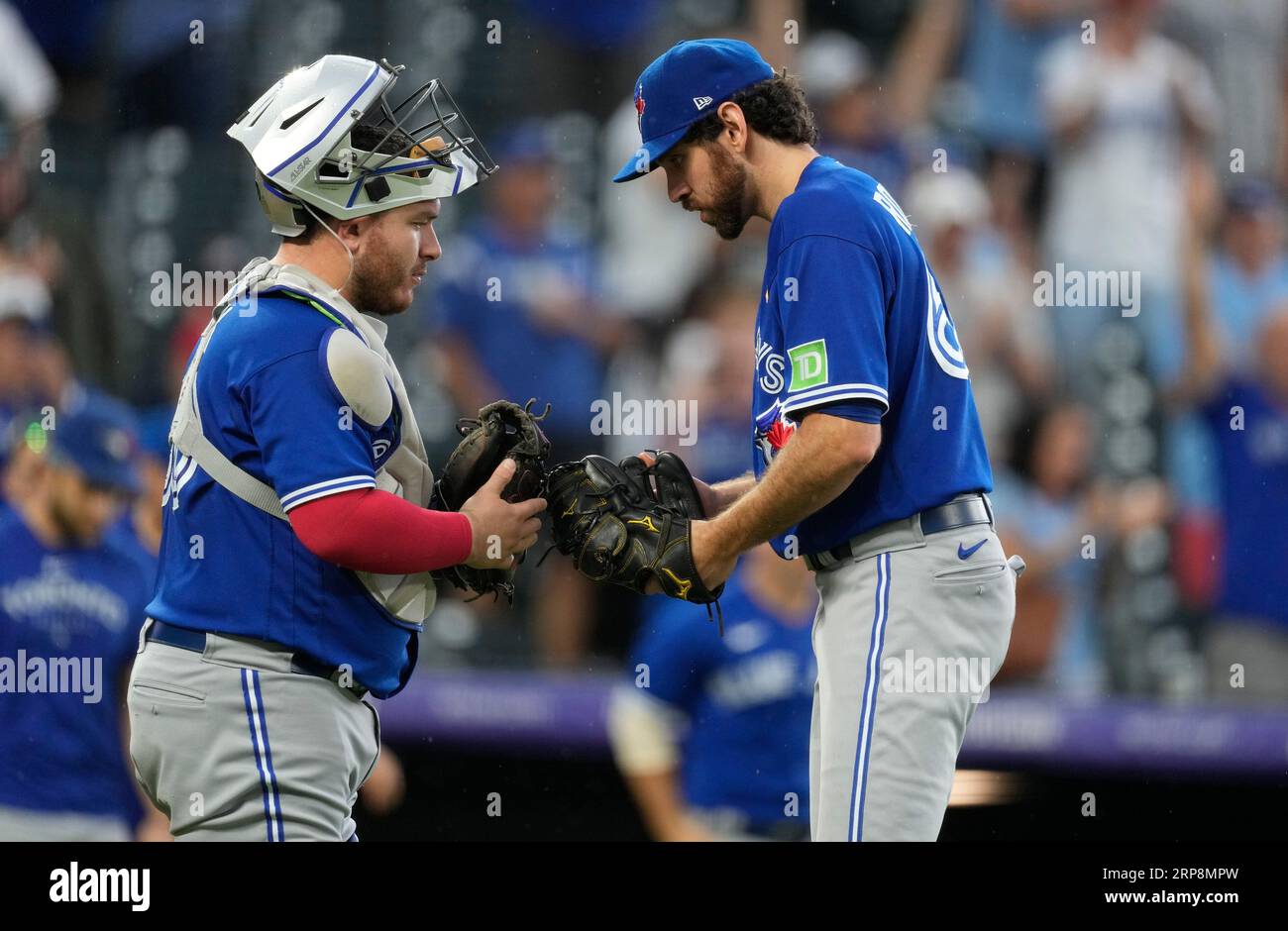 Toronto Blue Jays catcher Alejandro Kirk, left, congratulates relief ...